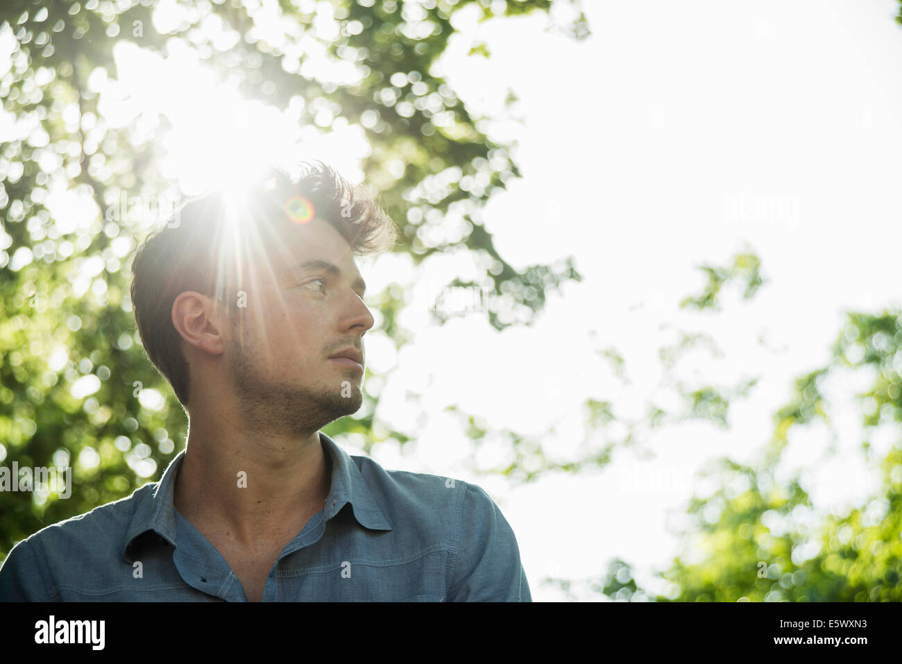 Young serious man staring hi-res stock photography and images - Alamy