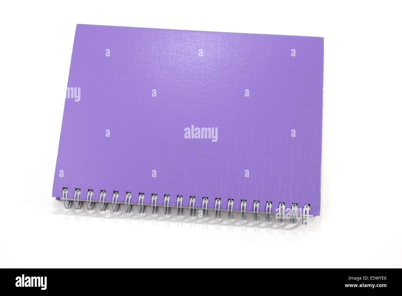 Purple business notebook isolated on white background Stock Photo - Alamy