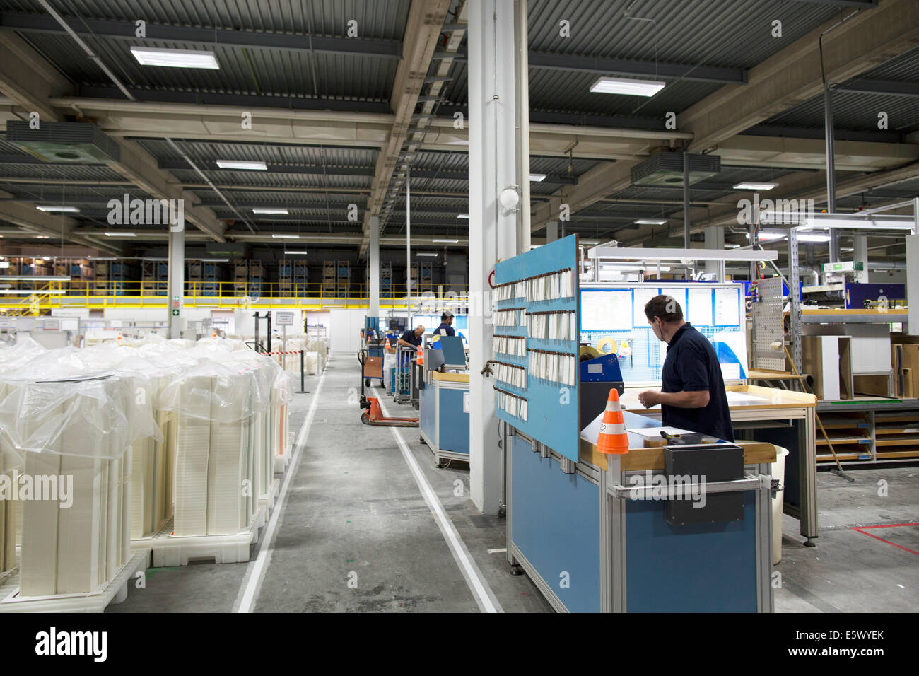 Workers in paper packaging factory Stock Photo - Alamy