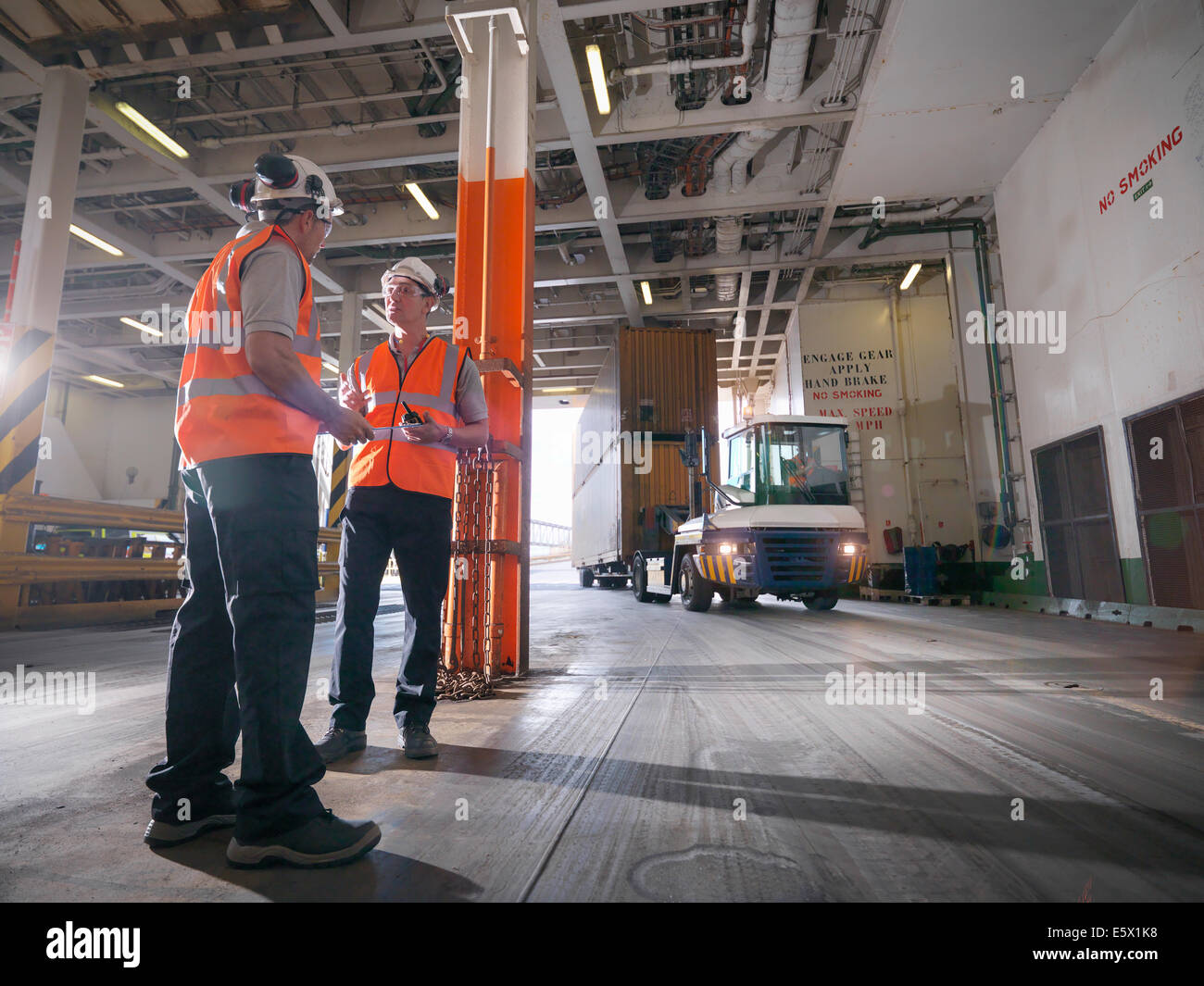 Loading shipping containers hi-res stock photography and images - Alamy