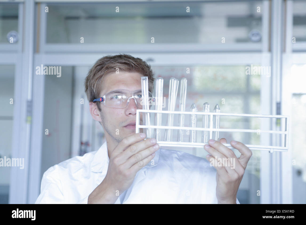Men in laboratory with test tubes hi-res stock photography and images ...