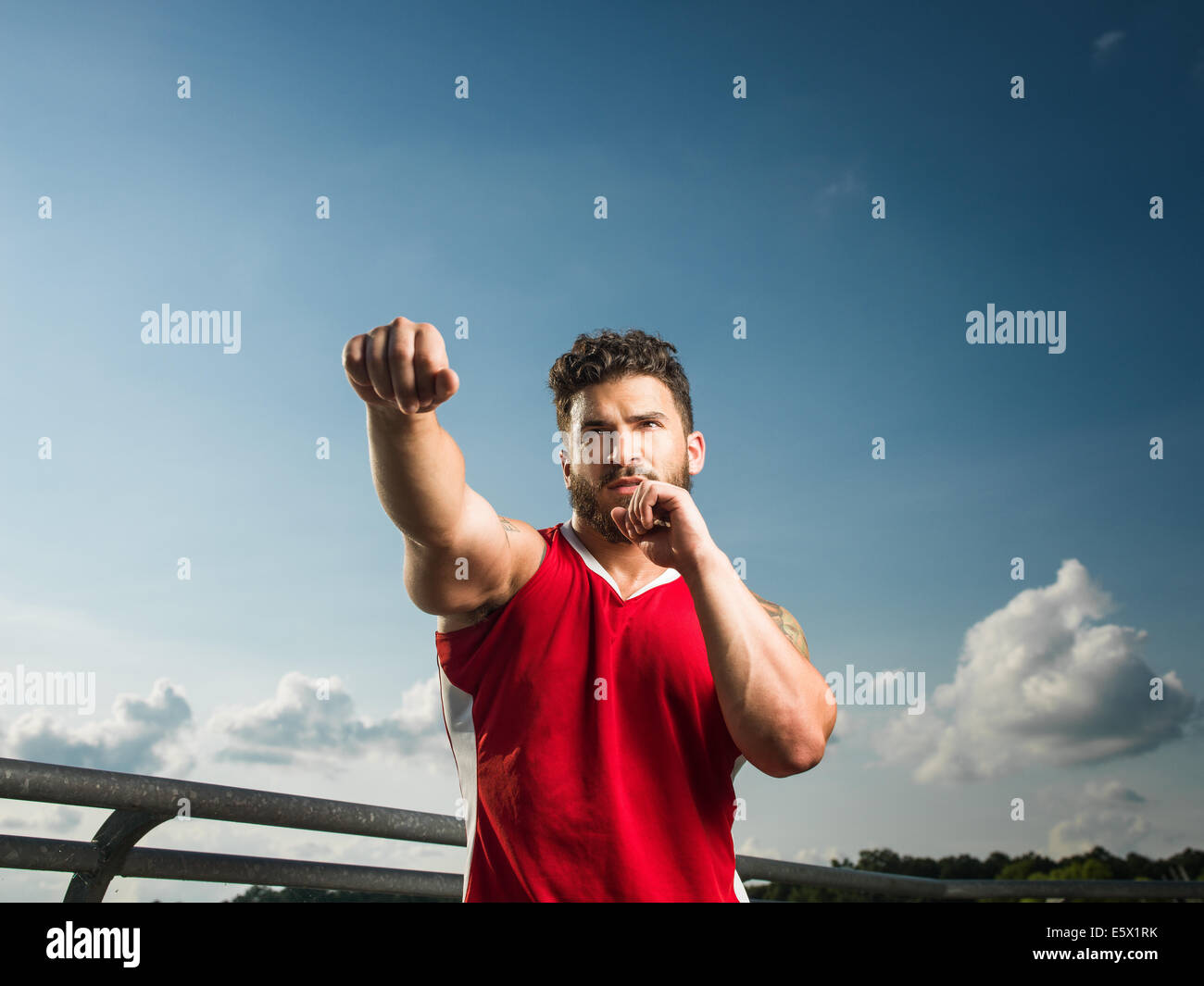 Low angle portrait of young male boxer training Stock Photo - Alamy
