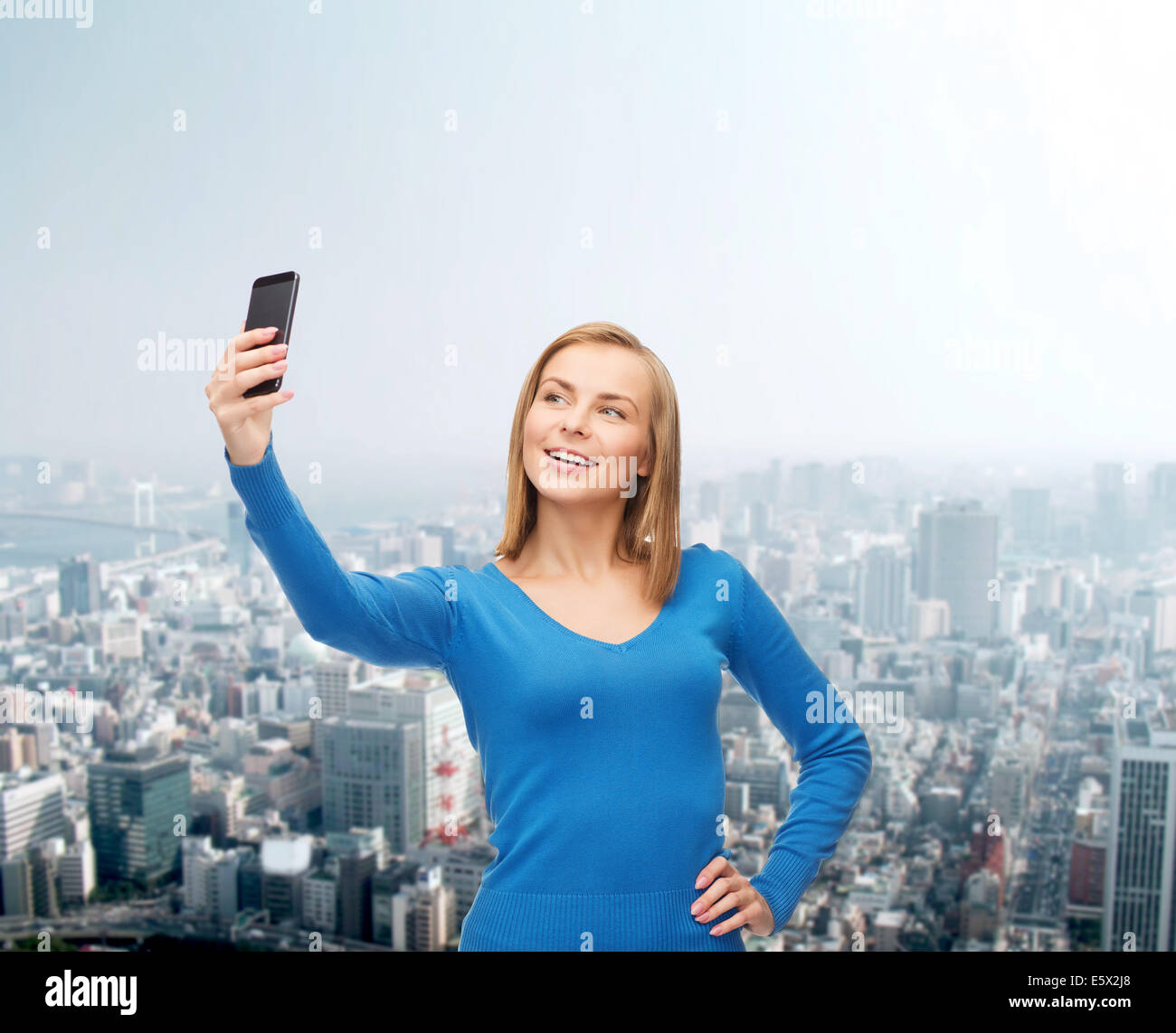 woman taking self picture with smartphone camera Stock Photo - Alamy