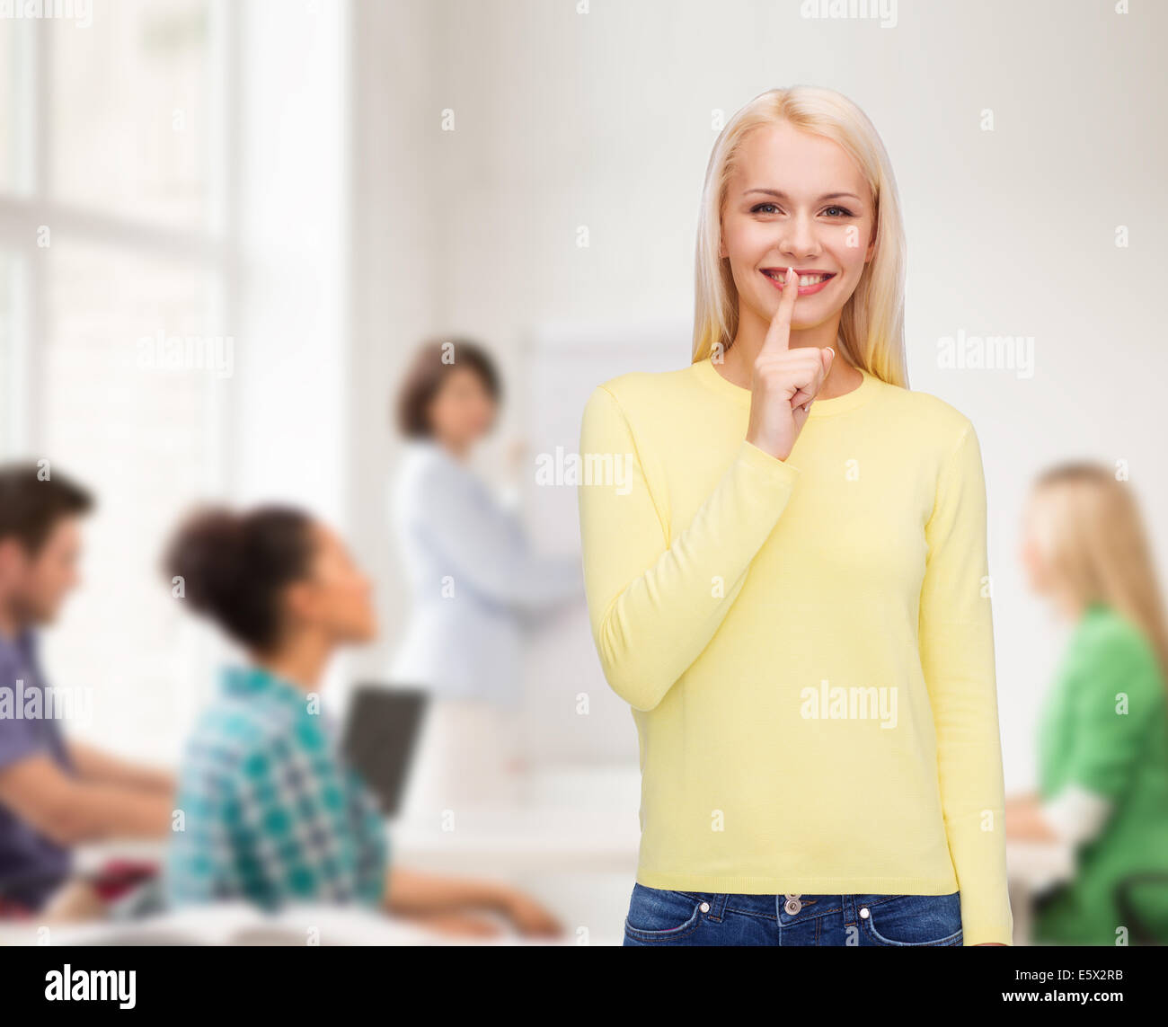 Woman face hand on lips quite hi-res stock photography and images - Alamy