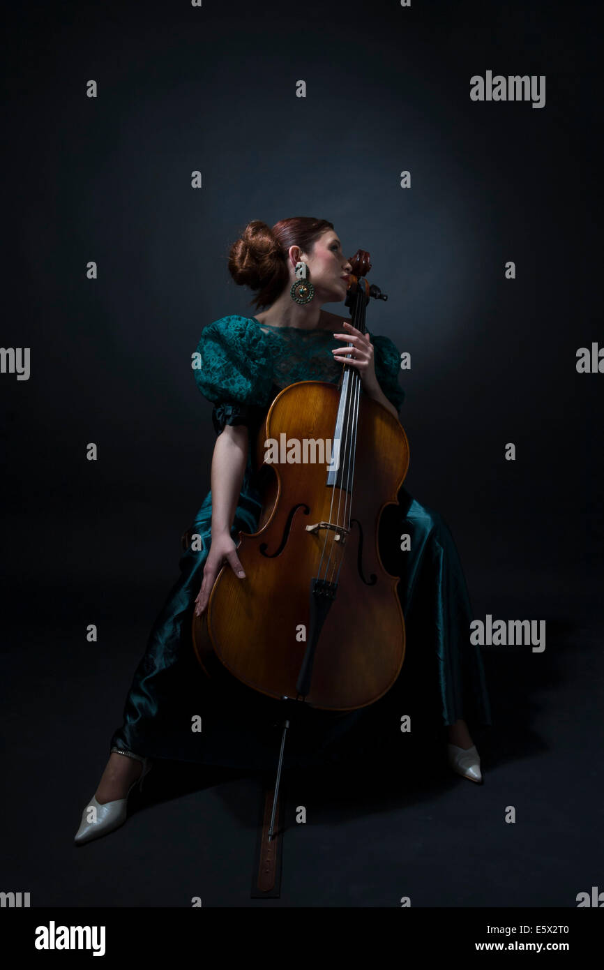 woman inspired with cello Stock Photo - Alamy