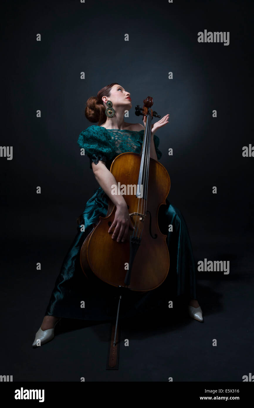 cellist woman looking for inspiration Stock Photo - Alamy