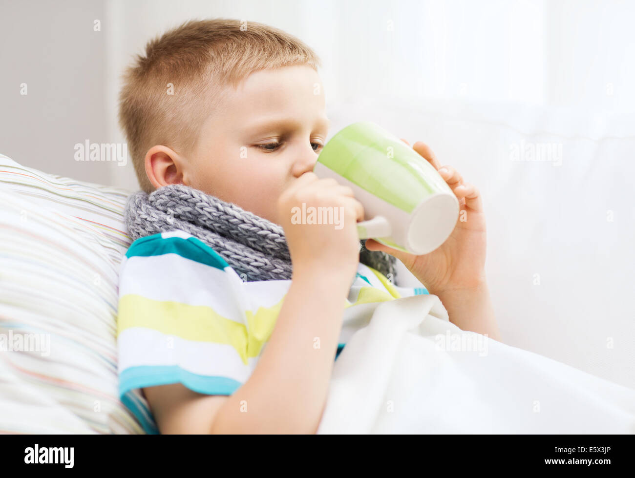 ill boy with flu at home Stock Photo - Alamy