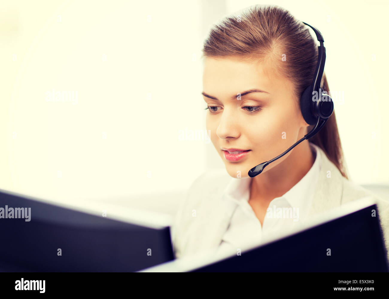 friendly female helpline operator Stock Photo - Alamy