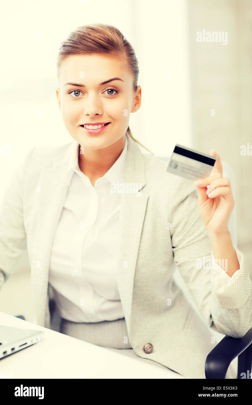 businesswoman with laptop showing credit card Stock Photo - Alamy