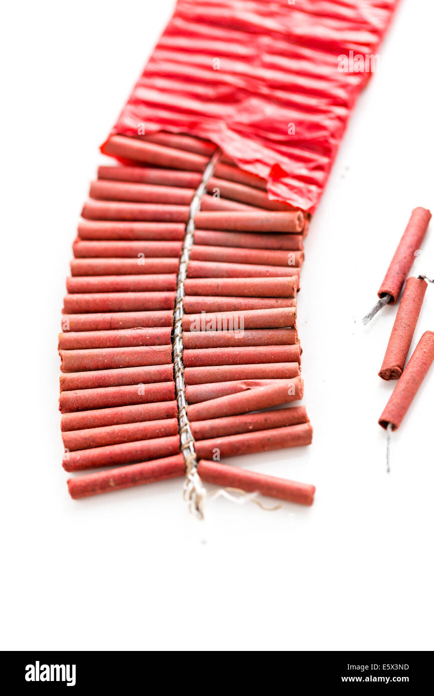 Roll of firecrackers on a white background Stock Photo - Alamy