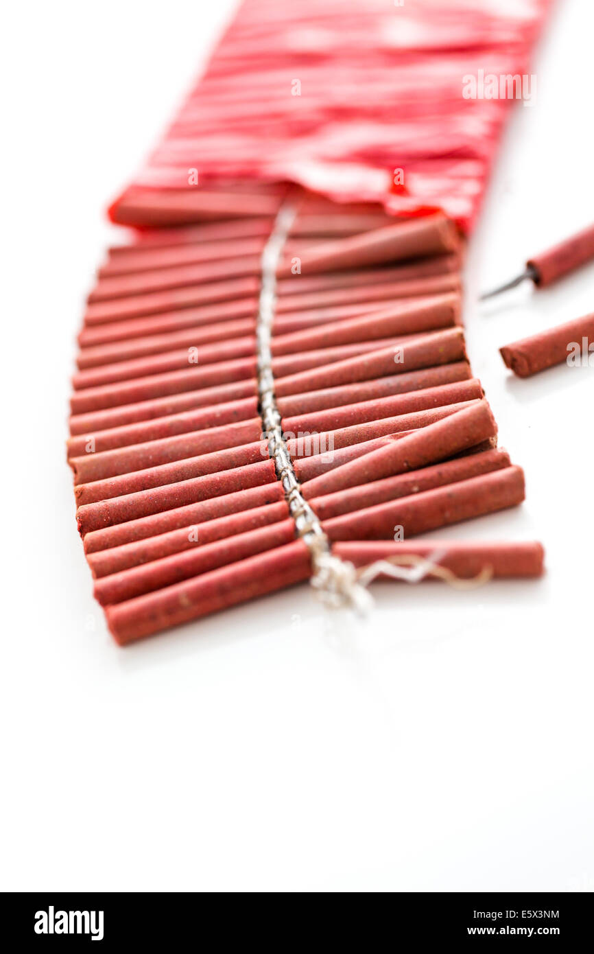 Roll of firecrackers on a white background Stock Photo - Alamy