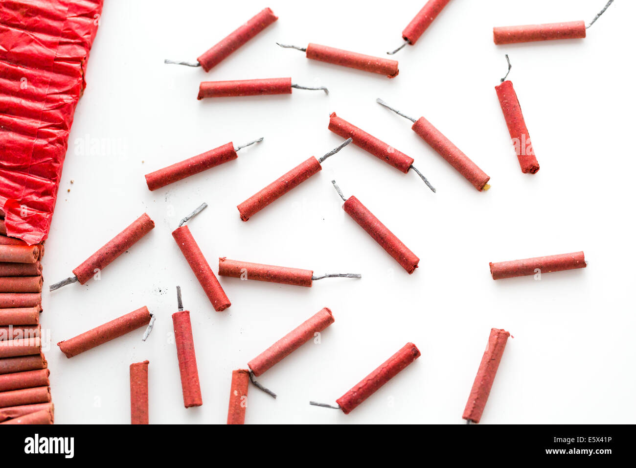Roll of firecrackers on a white background Stock Photo - Alamy