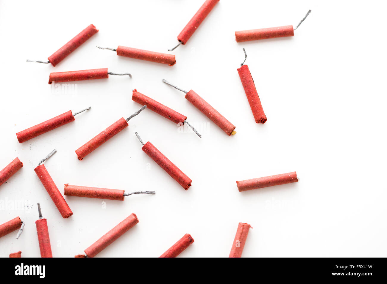 Roll of firecrackers on a white background Stock Photo - Alamy