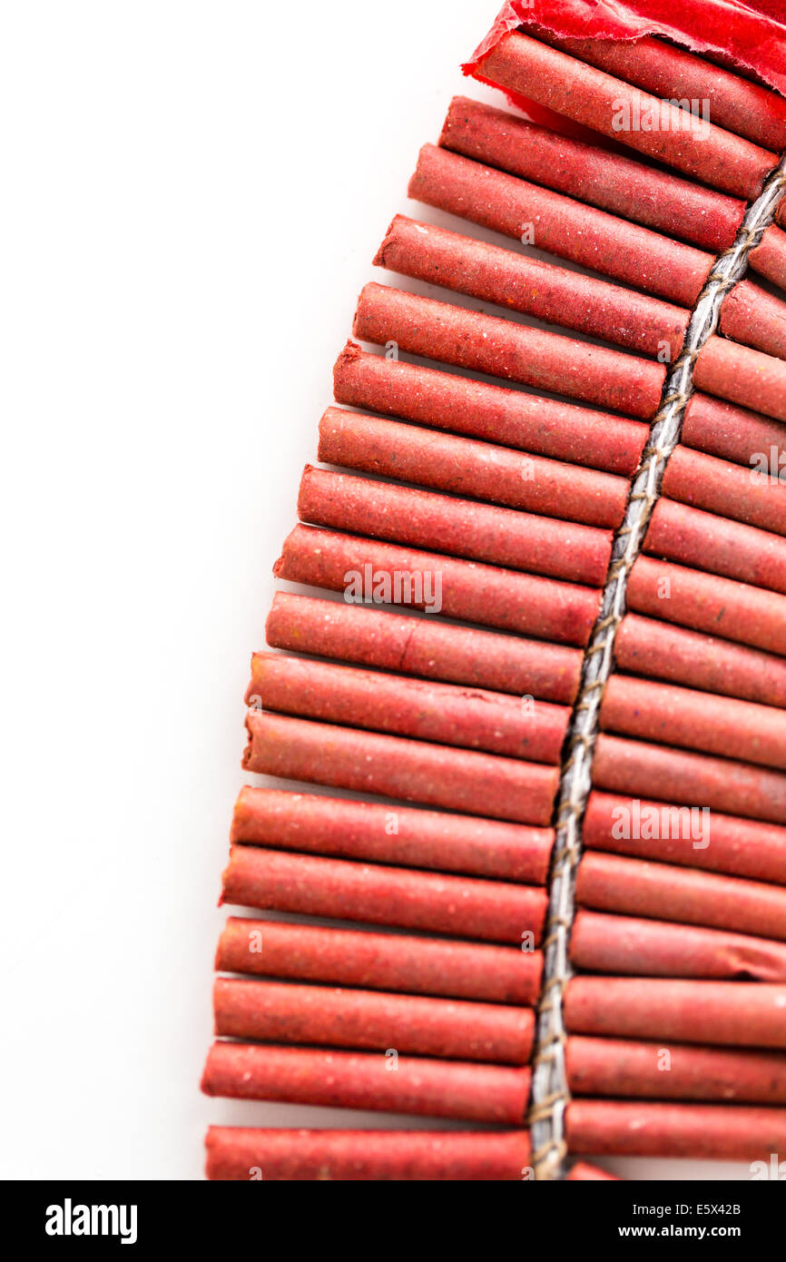 Roll of firecrackers on a white background Stock Photo - Alamy