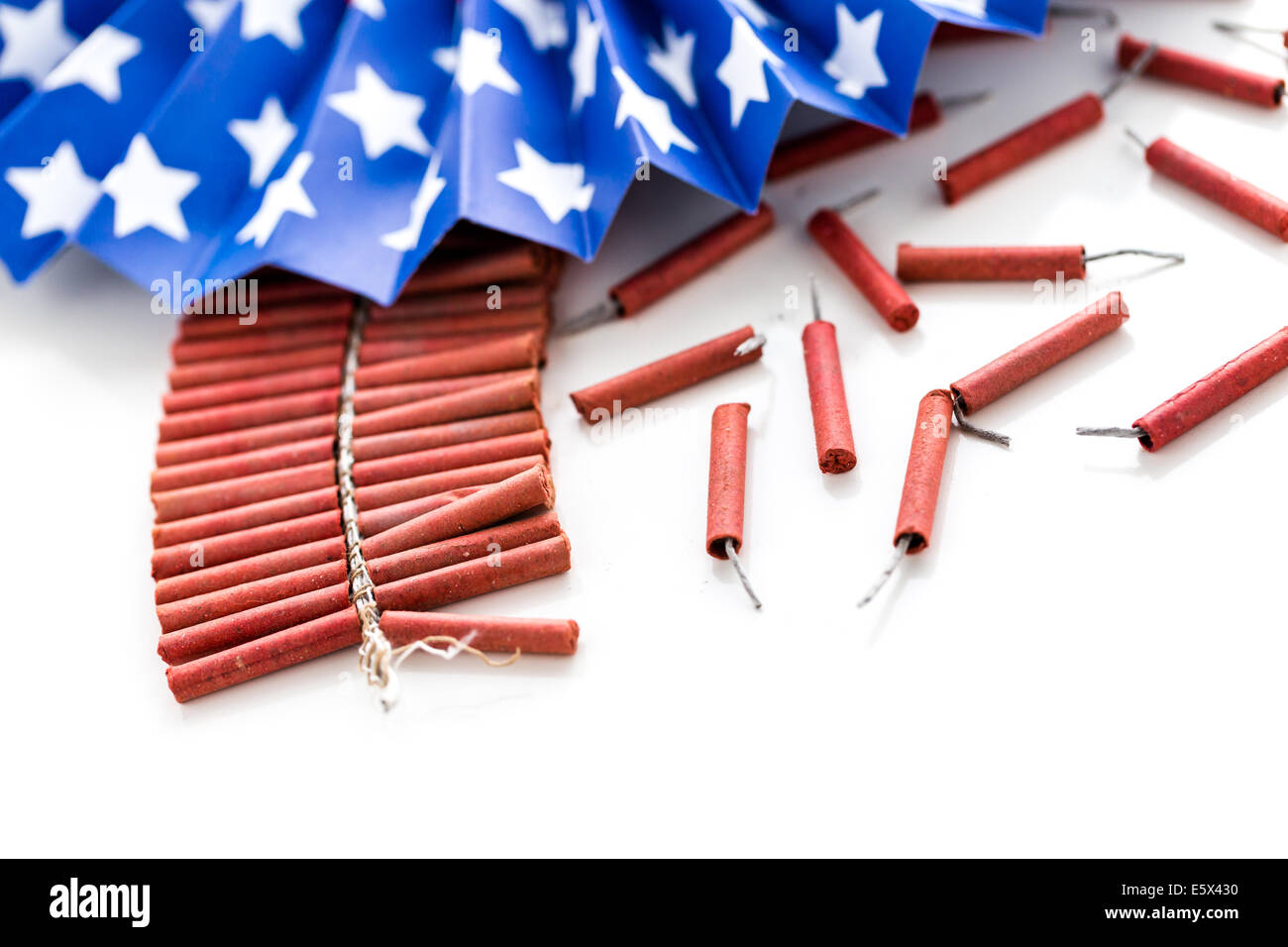 Roll of firecrackers on a white background Stock Photo - Alamy