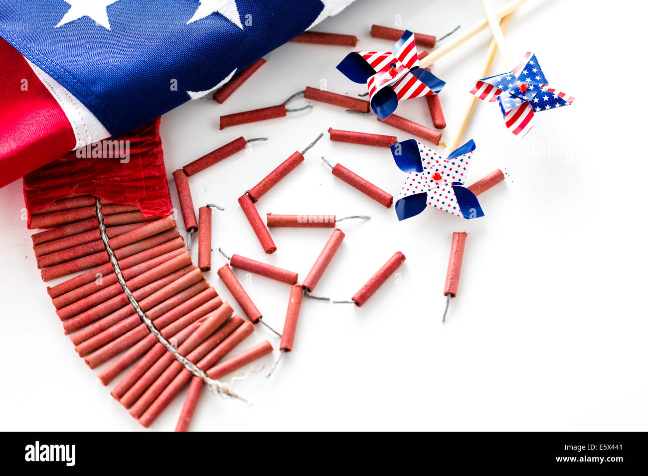 Roll of firecrackers with American flag on a white background Stock ...