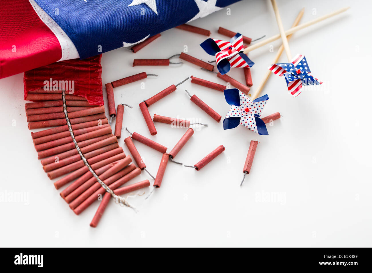 Roll of firecrackers with American flag on a white background Stock ...