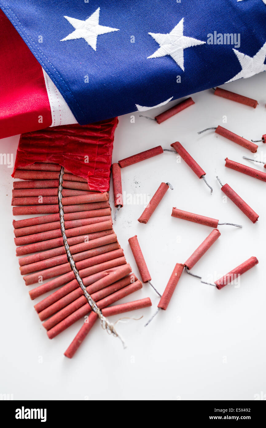 Roll of firecrackers with American flag on a white background Stock ...