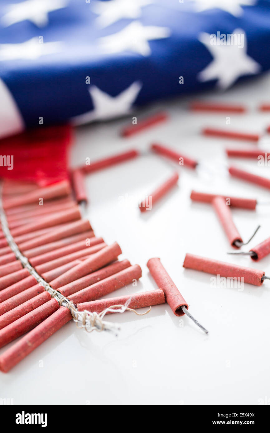 Roll of firecrackers with American flag on a white background Stock ...