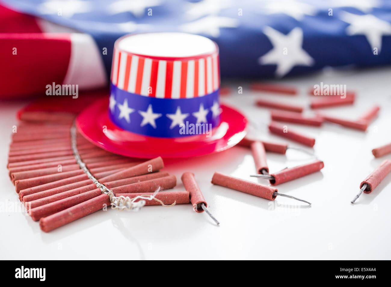 Roll of firecrackers with American flag on a white background Stock ...