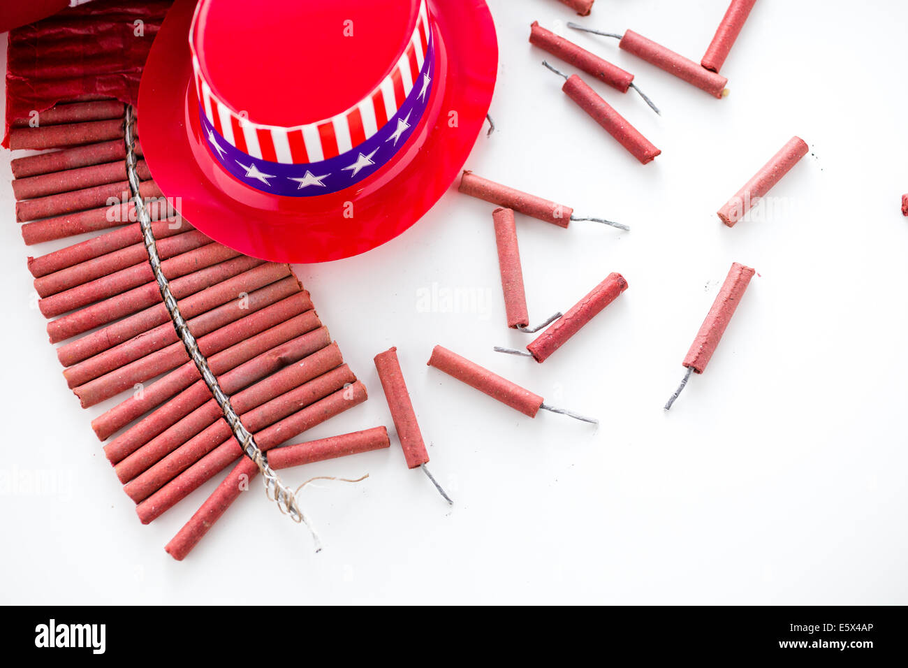 Roll of firecrackers with American flag on a white background Stock ...