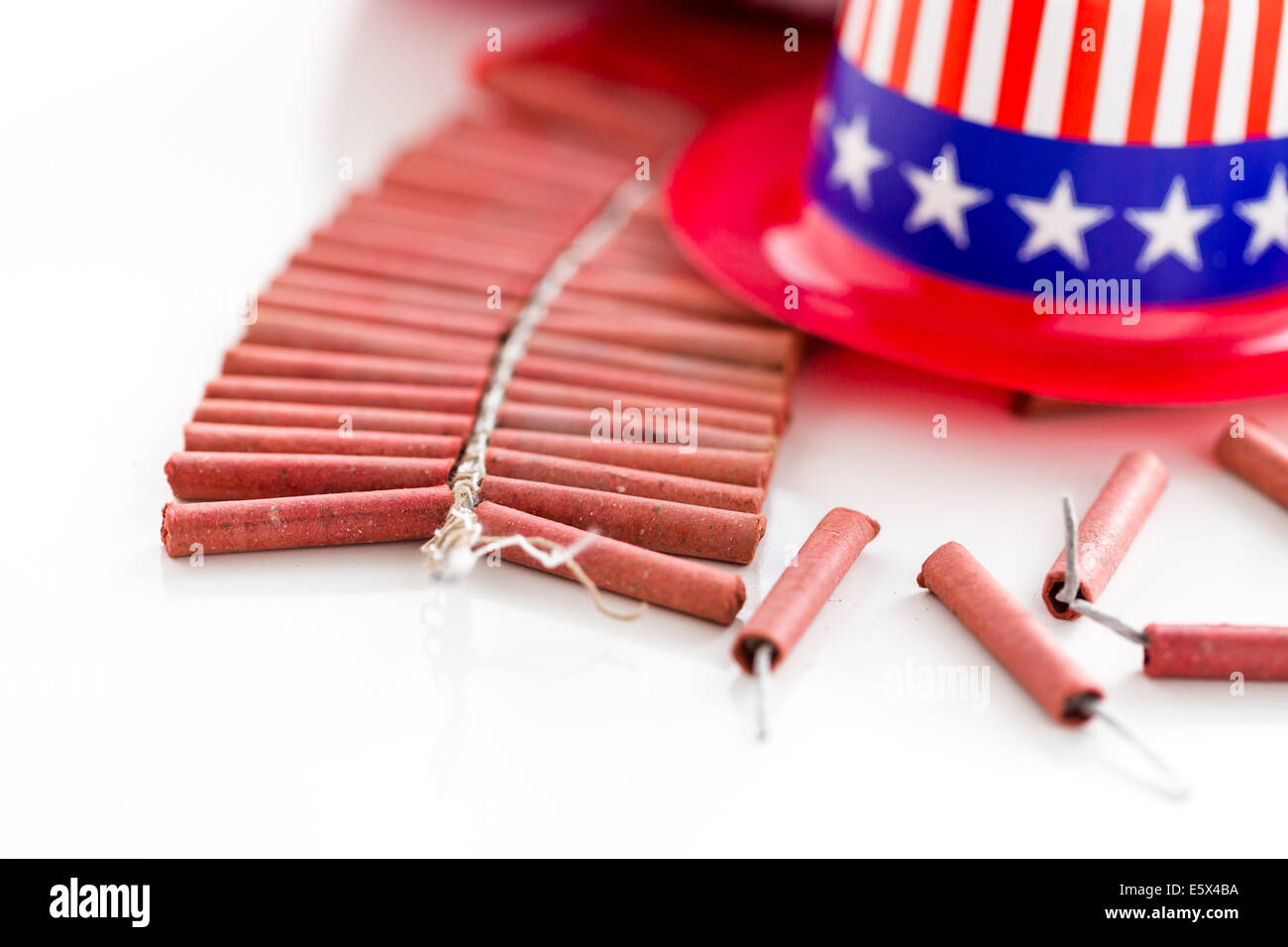 Roll of firecrackers with American flag on a white background Stock ...