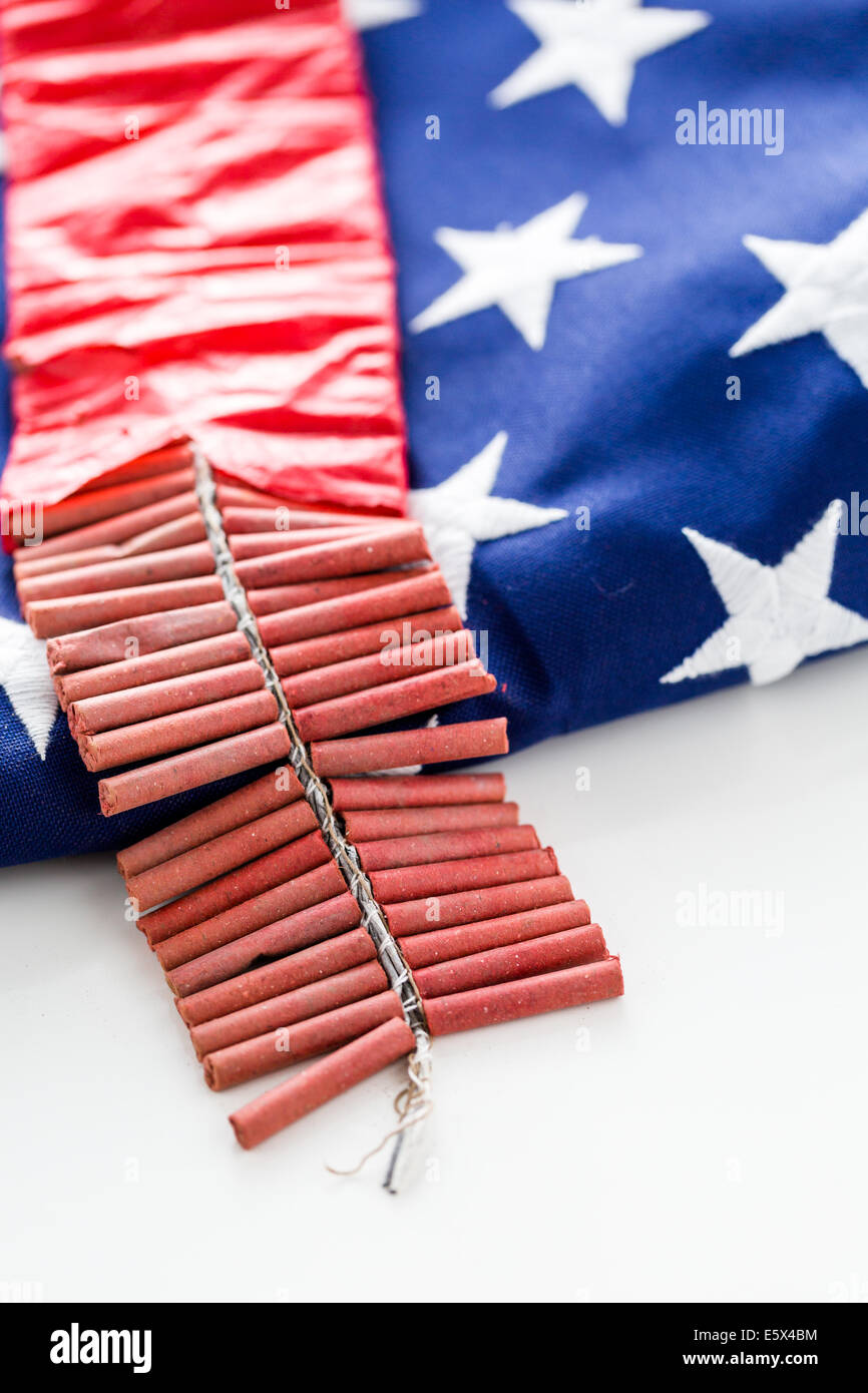 Roll of firecrackers with American flag on a white background Stock ...
