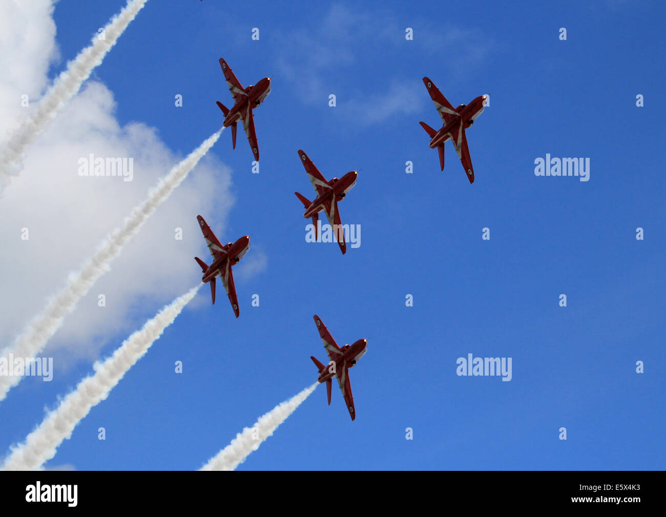 Red Arrows flying through the clouds Stock Photo - Alamy
