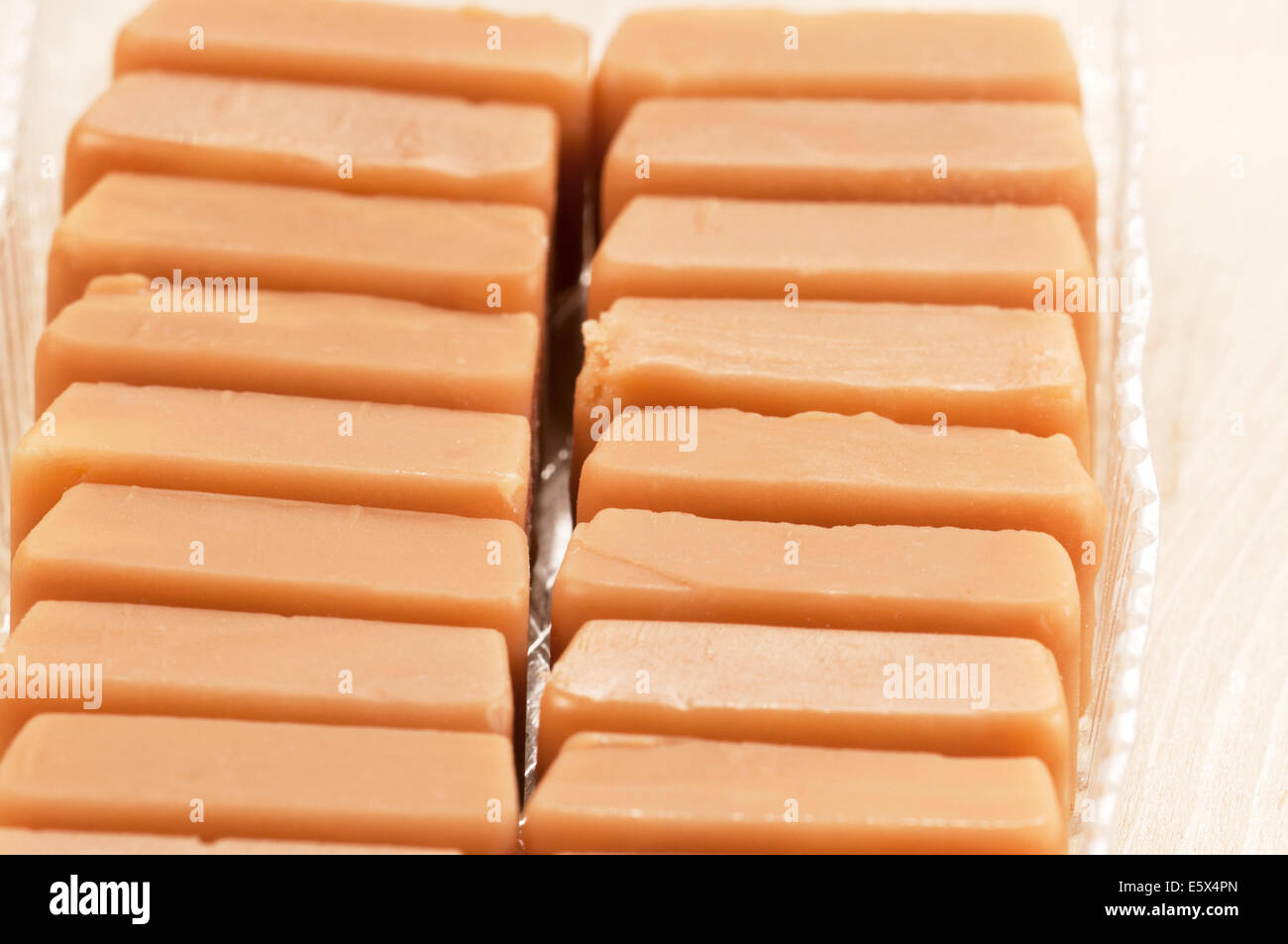Toffee candies in a package, closeup shot Stock Photo - Alamy