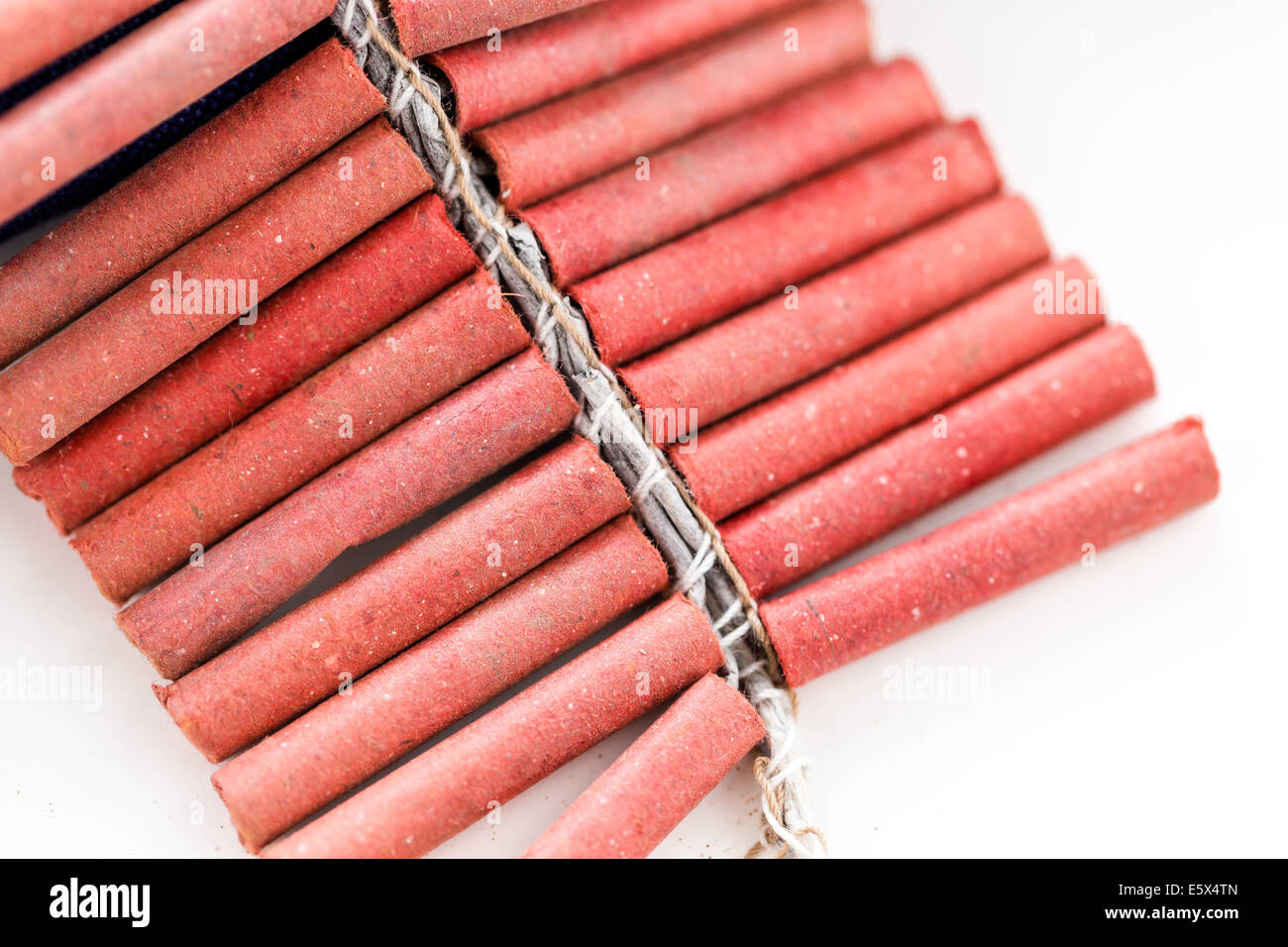 Roll of firecrackers on a white background Stock Photo - Alamy