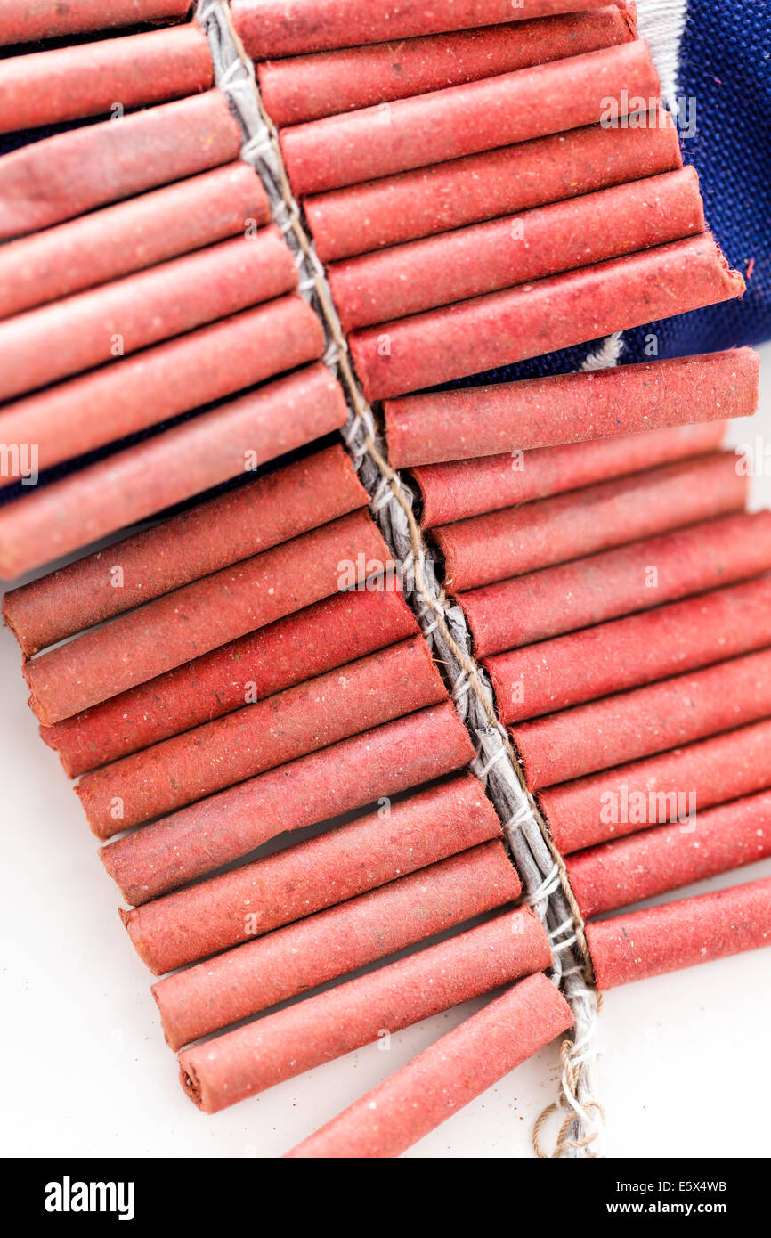Roll of firecrackers with folded American flag Stock Photo - Alamy