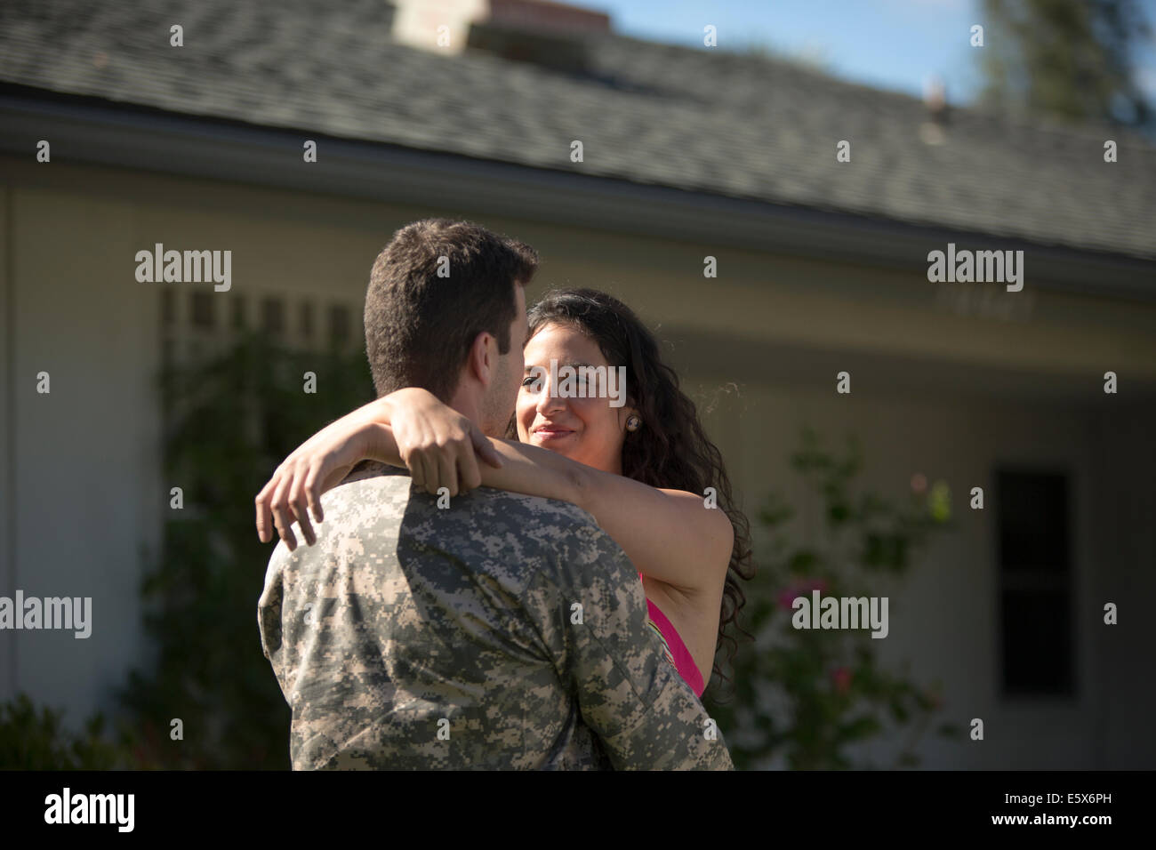 Army uniform man hugging hi-res stock photography and images - Alamy
