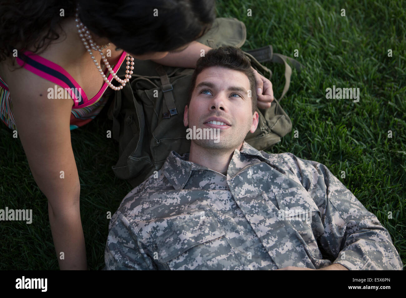 Overhead view of male soldier and wife in garden Stock Photo - Alamy