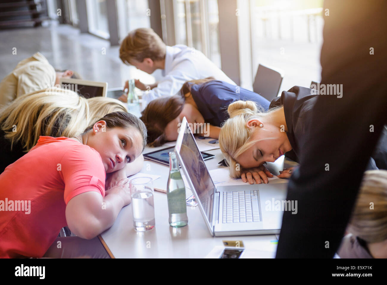 Man exhausted looking after woman hi-res stock photography and images ...