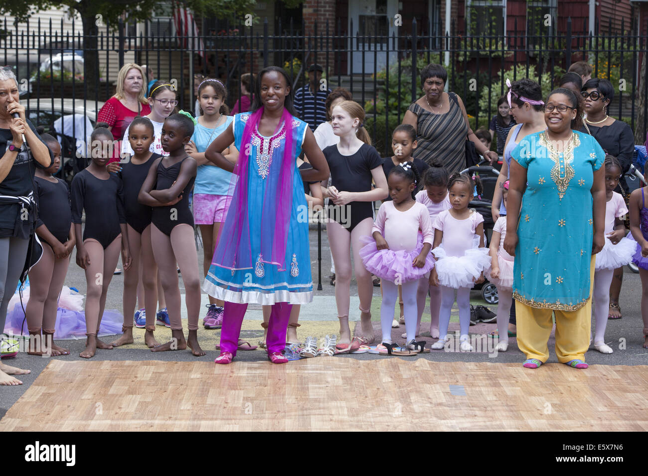 Young dancers from a local dance studio perform for the community at a ...