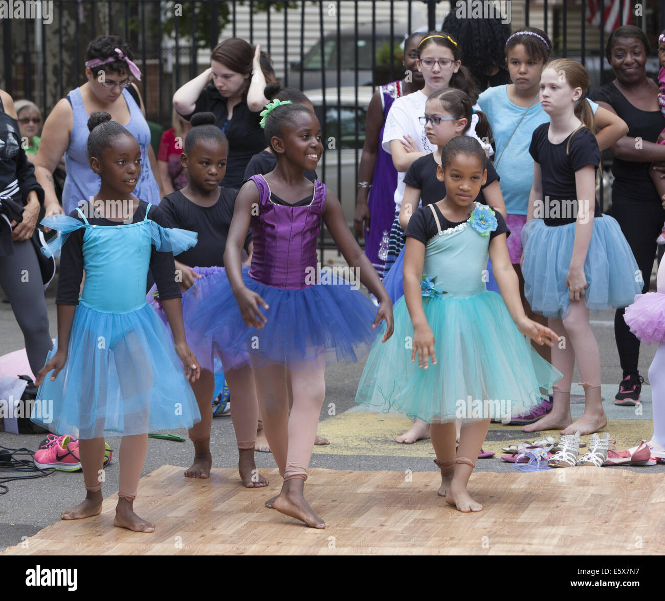 Young dancers from a local dance studio perform for the community at a ...