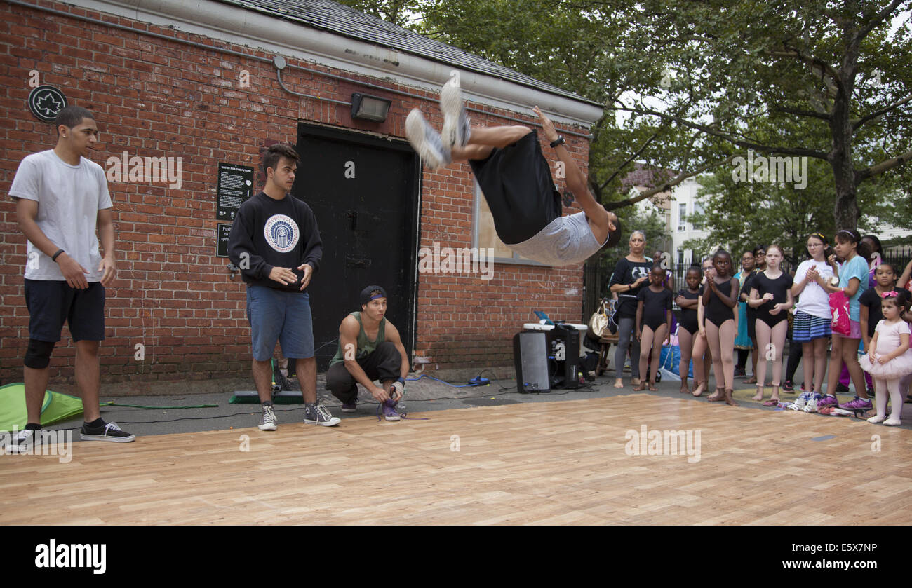 Young dancers from a local dance studio perform for the community at a ...