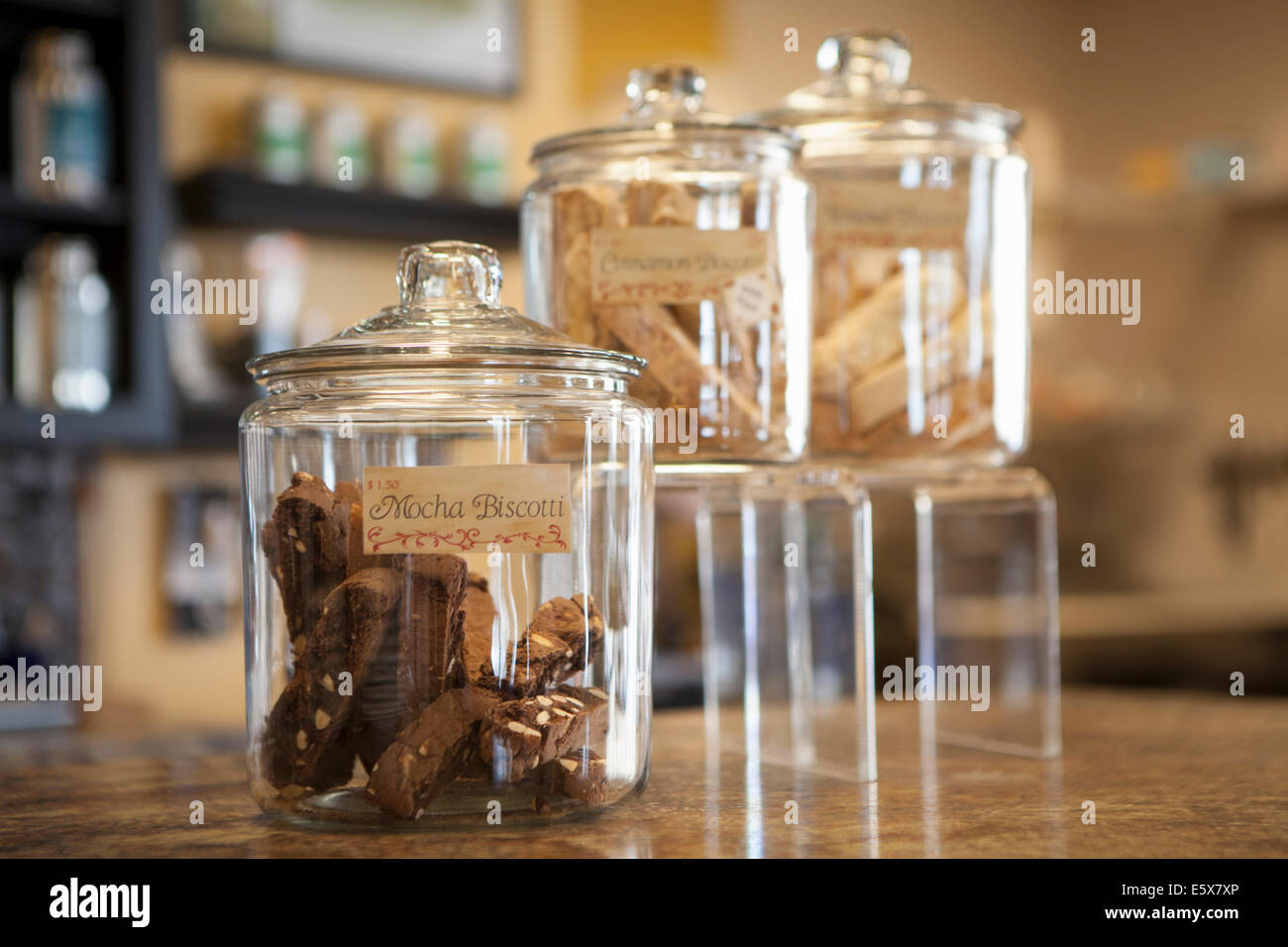 Close up of jars of biscotti on cafe counter Stock Photo - Alamy