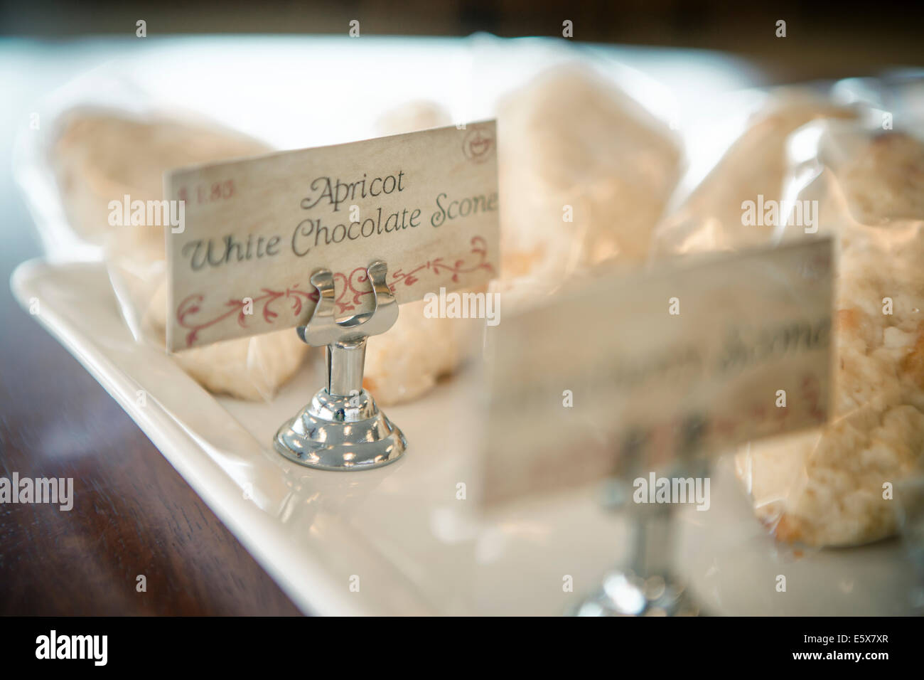 Close up of labeled scones on tray in cafe Stock Photo - Alamy