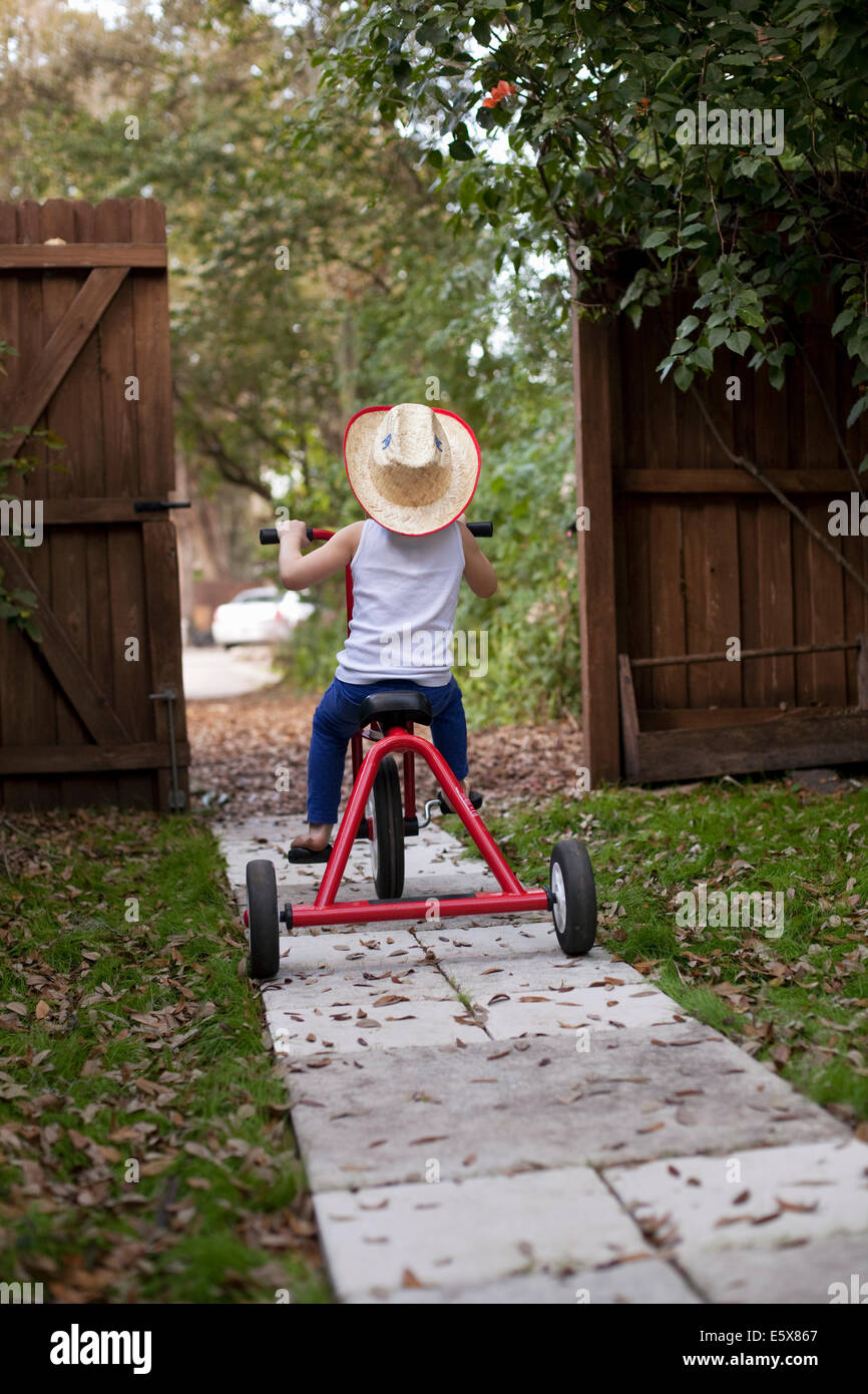 Girl riding tricycle hi-res stock photography and images - Alamy