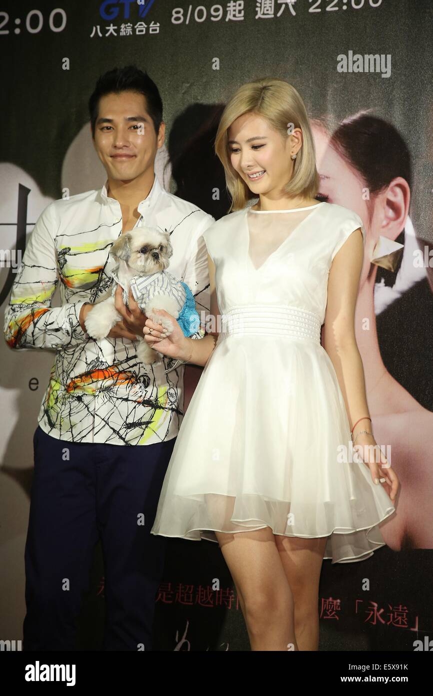 Taipei. 6th Aug, 2014. Actor Lan Ching Lung and actress Amber An attend ...