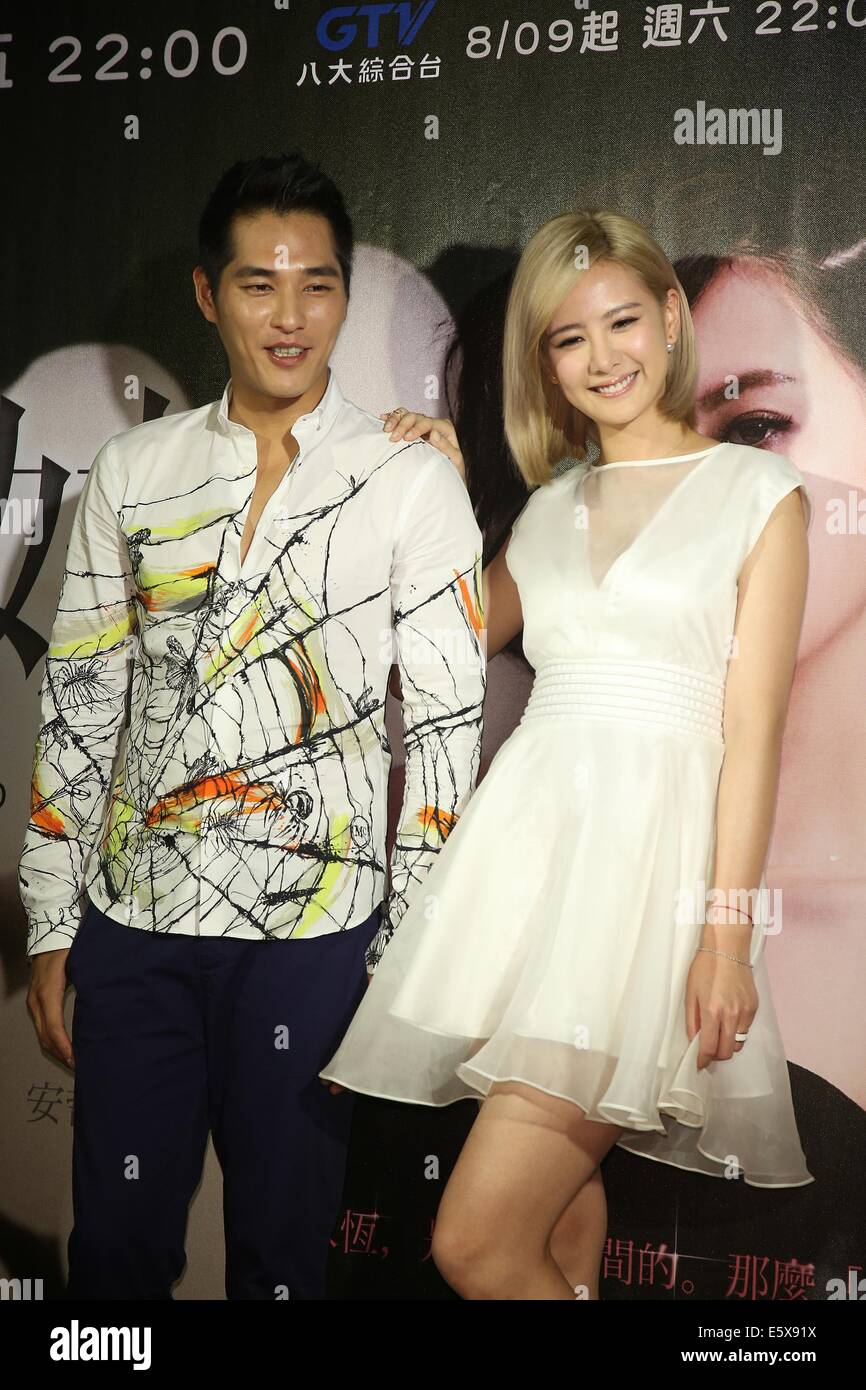 Taipei. 6th Aug, 2014. Actor Lan Ching Lung and actress Amber An attend ...
