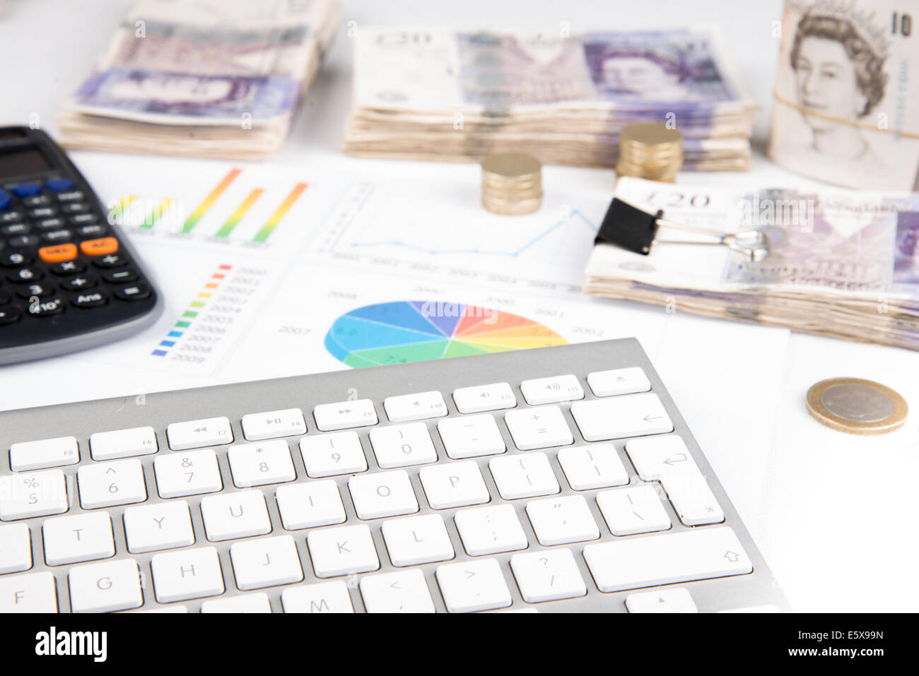 Calculator money cash pound coins hi-res stock photography and images ...