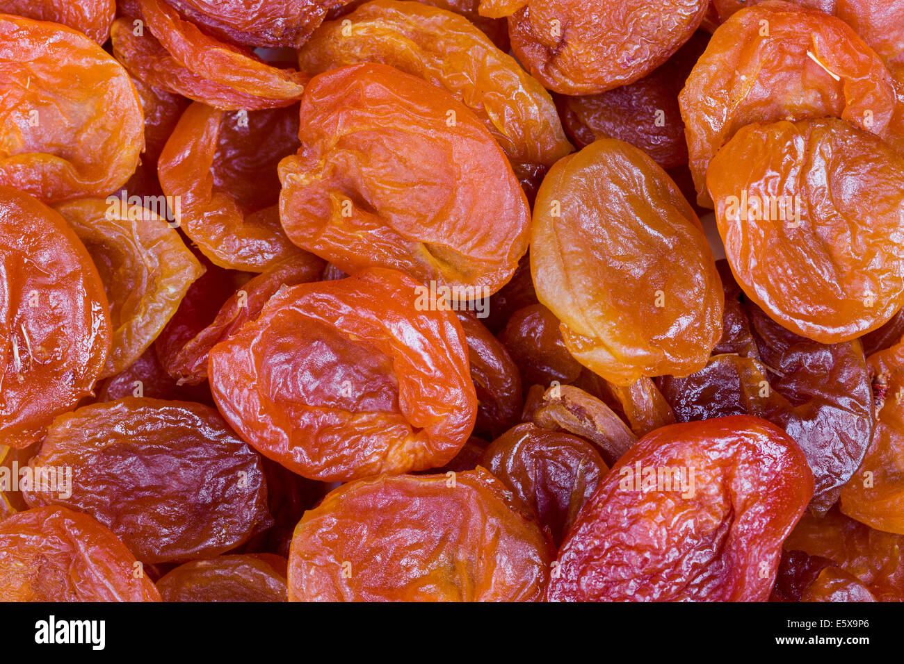 red and orange dried apricots in macro Stock Photo - Alamy