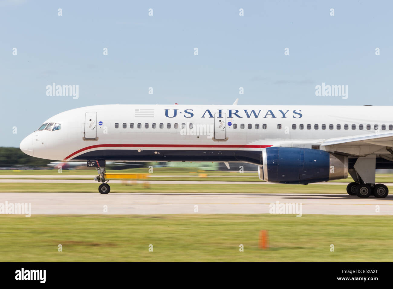 A U.S. Airways flight taking off from an airport Stock Photo - Alamy