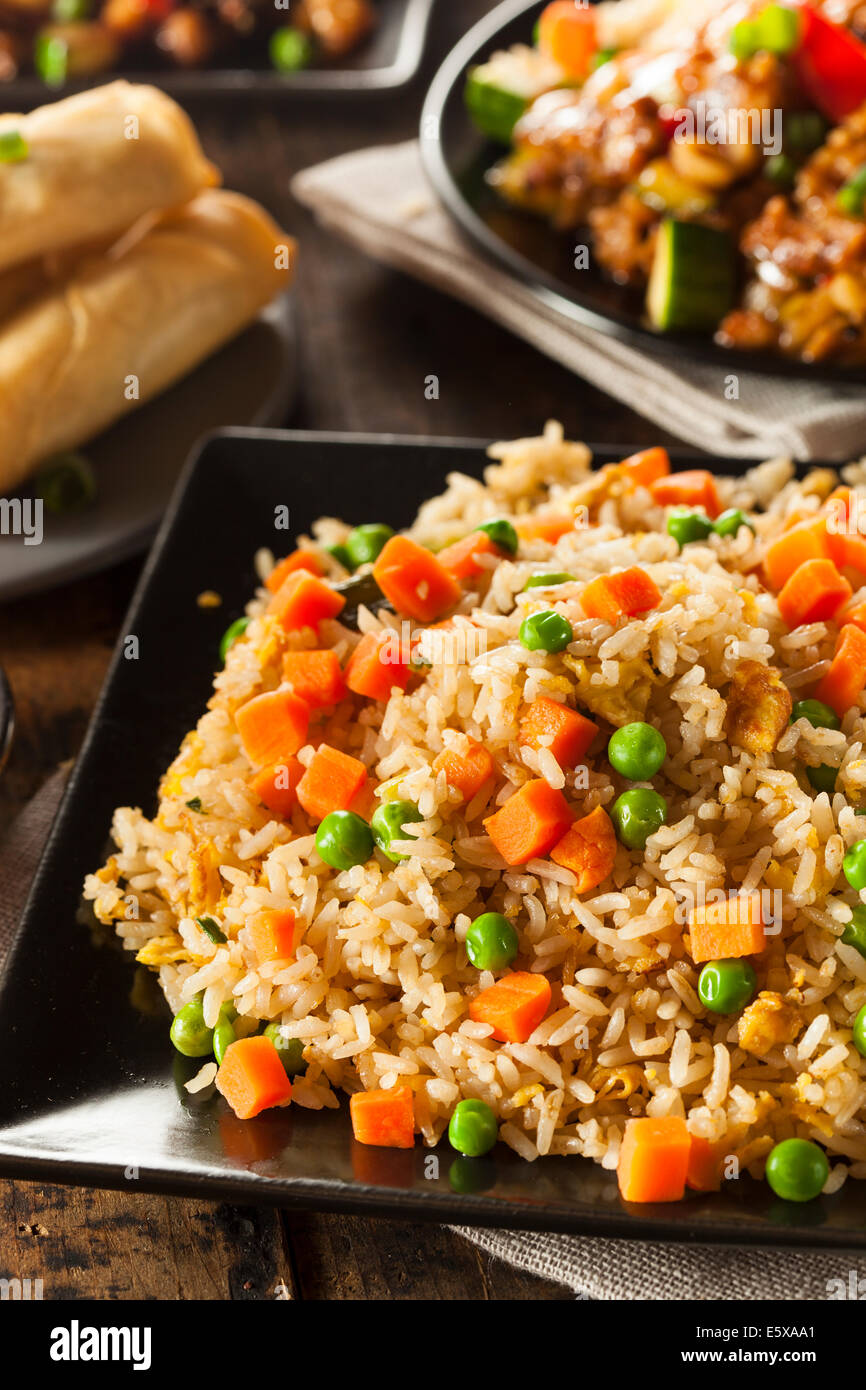 Healthy Homemade Fried Rice with Carrots and Peas Stock Photo - Alamy
