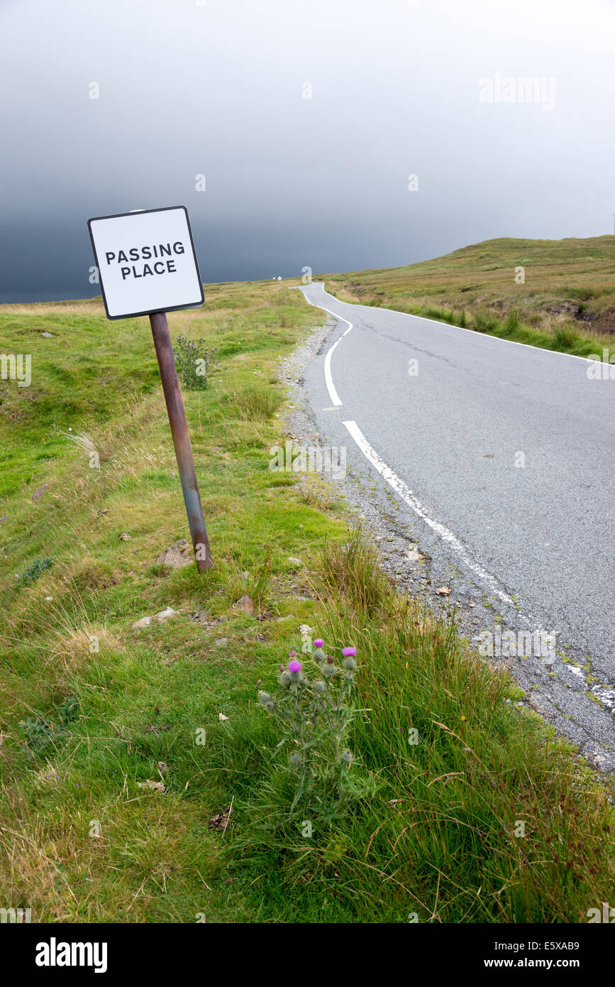 A passing place sign at the roadside on a single track road in the Isle ...