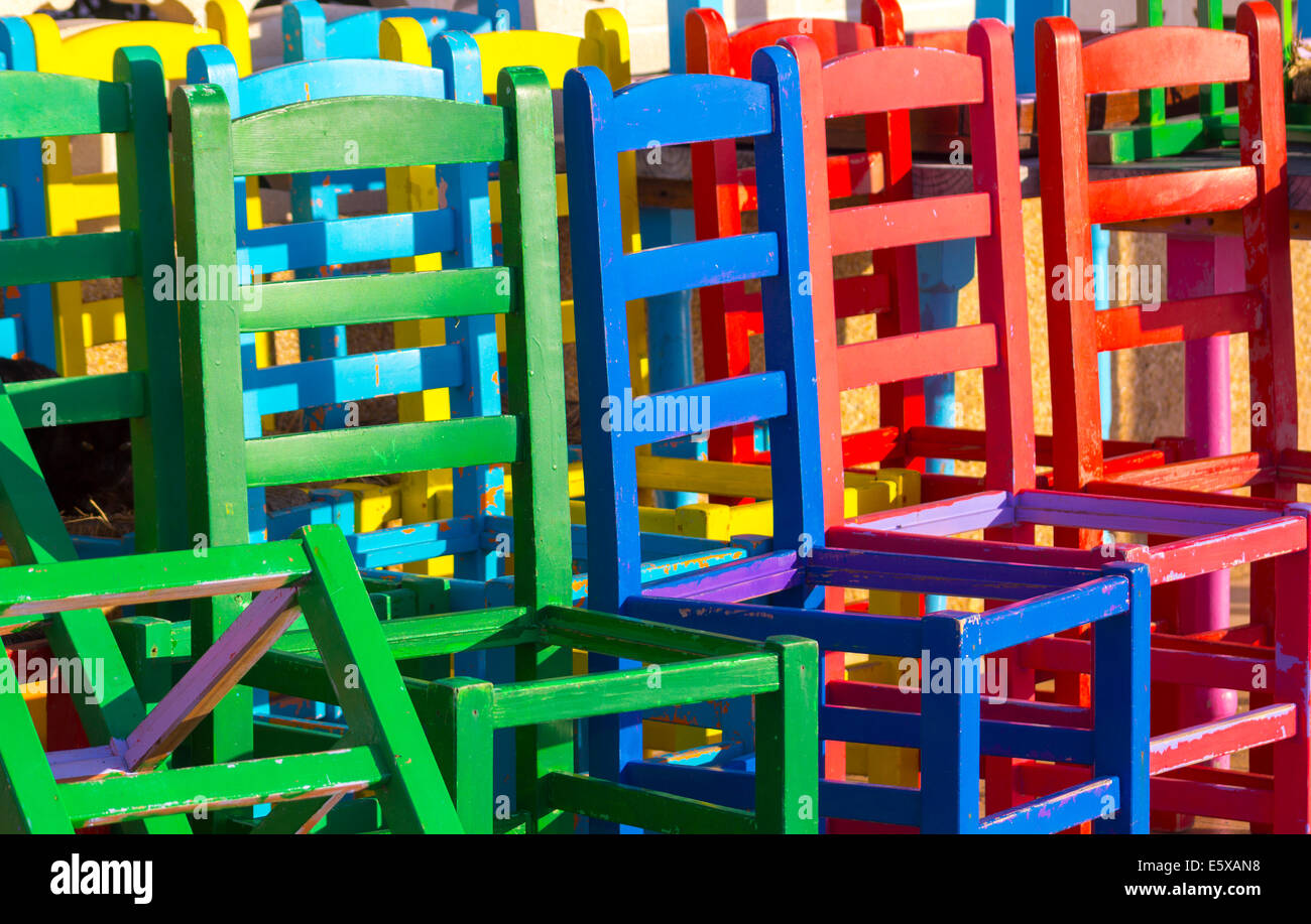 many chairs of different colors together Stock Photo - Alamy