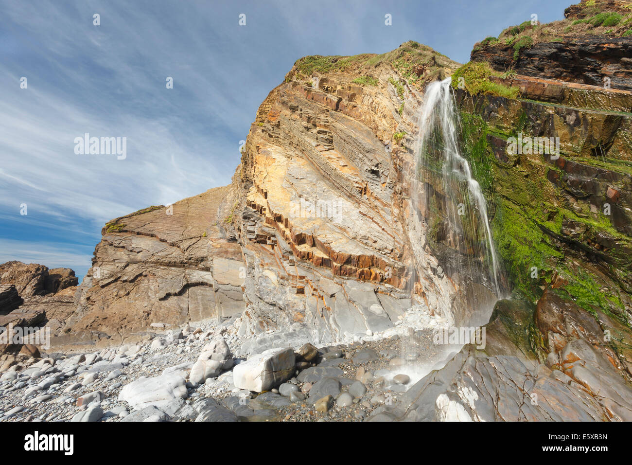 Waterfall on the beach at Sandymouth near bude Cornwall England UK ...