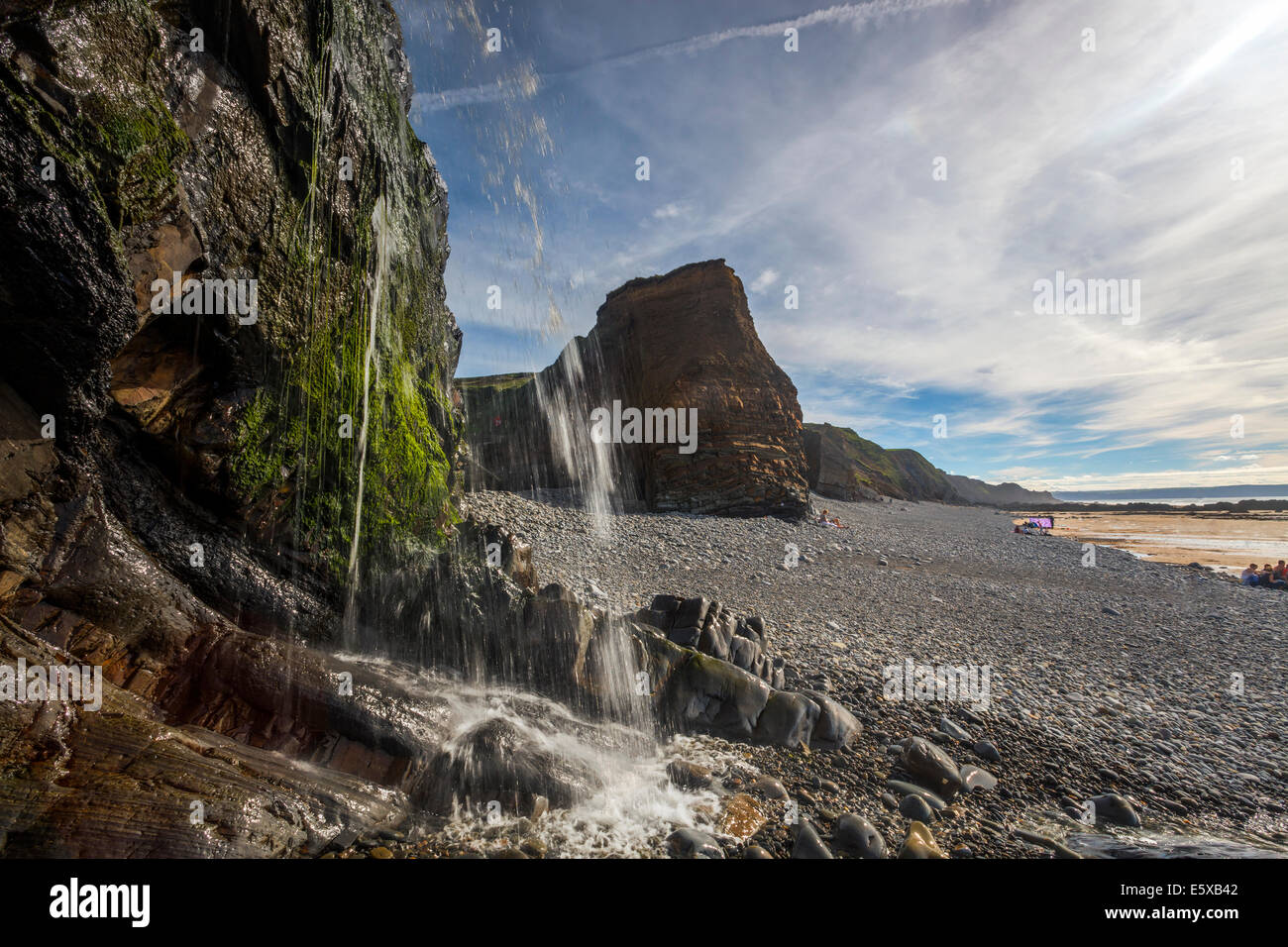 Waterfall on the beach at Sandymouth near bude Cornwall England UK ...
